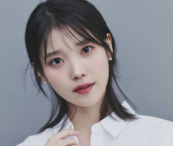 IU donates 500 million won to eight charities, hospitals - KPOP HIT